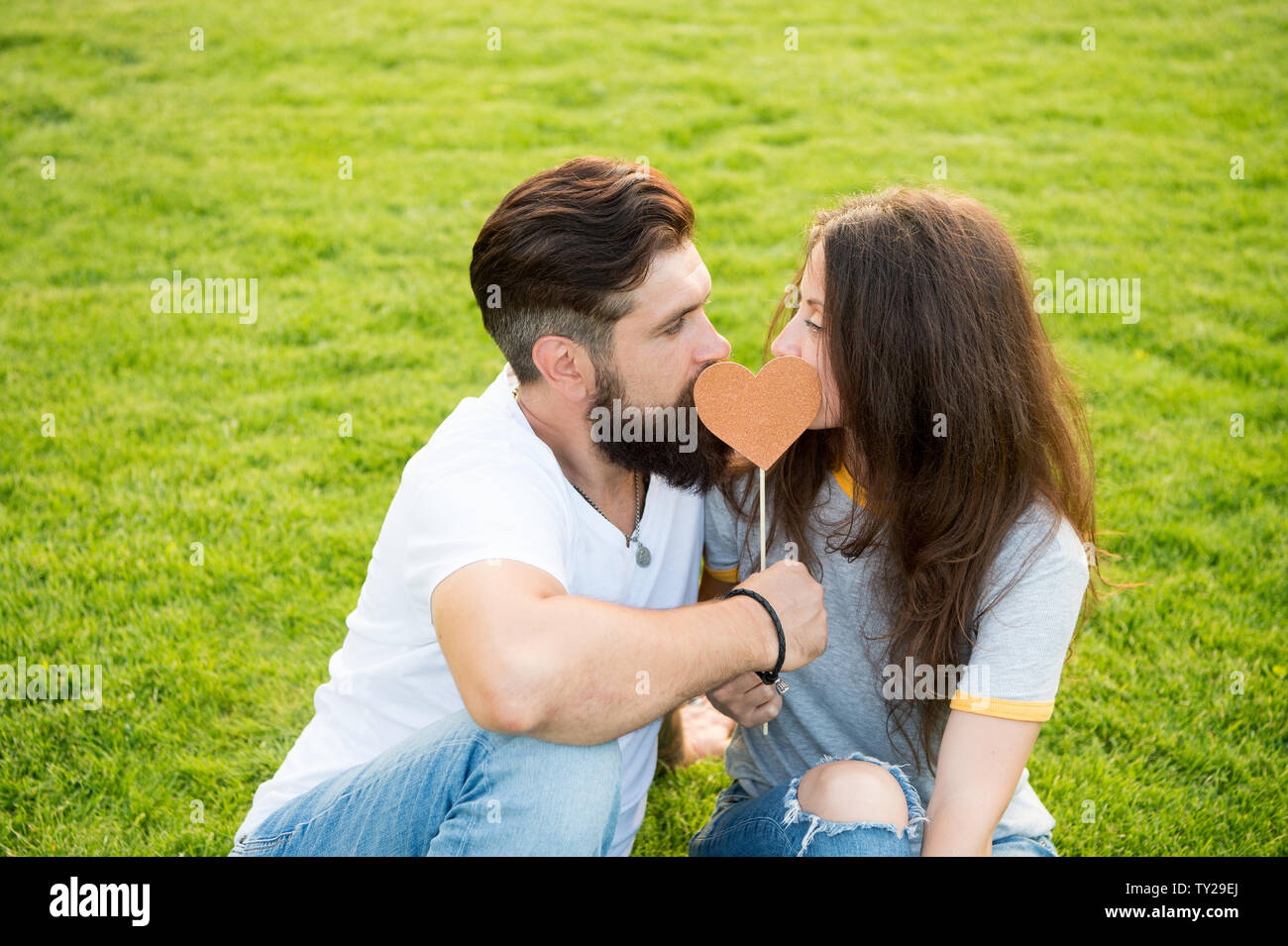 Kissing in secret hi-res stock photography and images - Alamy
