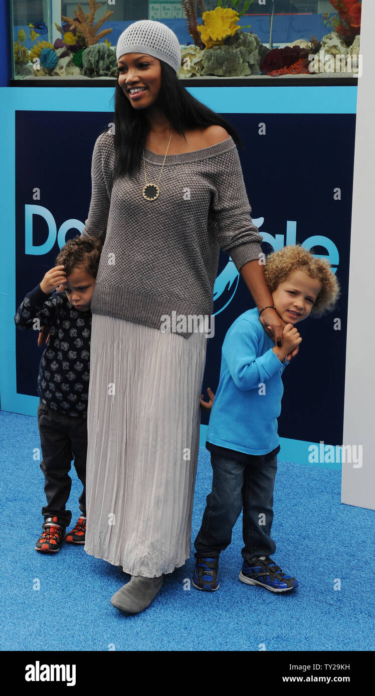 Actress Garcelle Beauvais and her twin sons Jaid (L) and Jax, attend ...