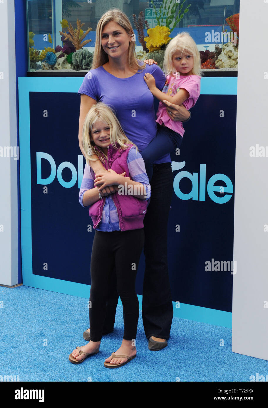 Volleyball star turned model Gabrielle Reece and her daughters Reece (L ...