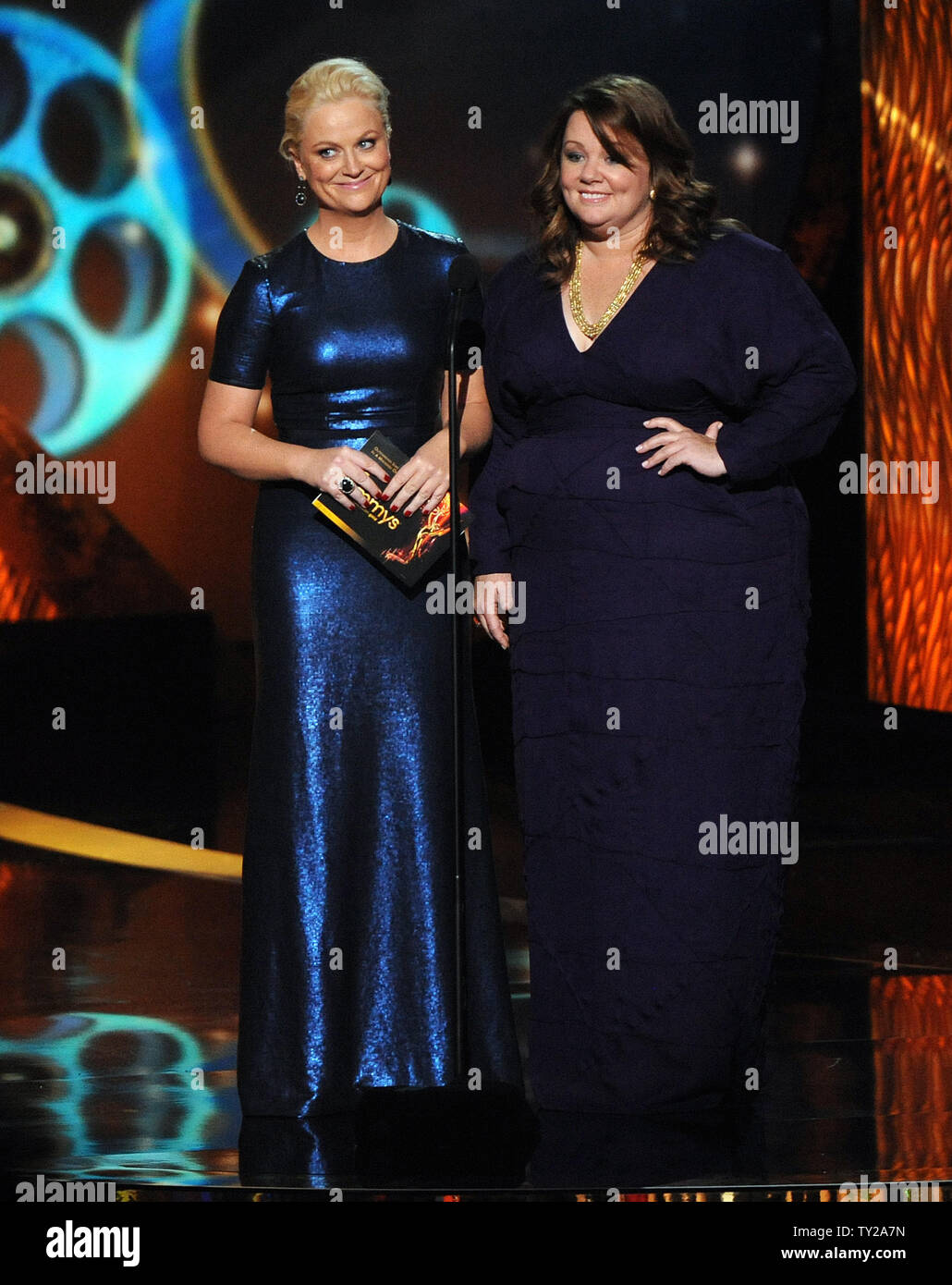 Actresses Amy Poehler (L) and Melissa McCarthy present during the 63rd ...