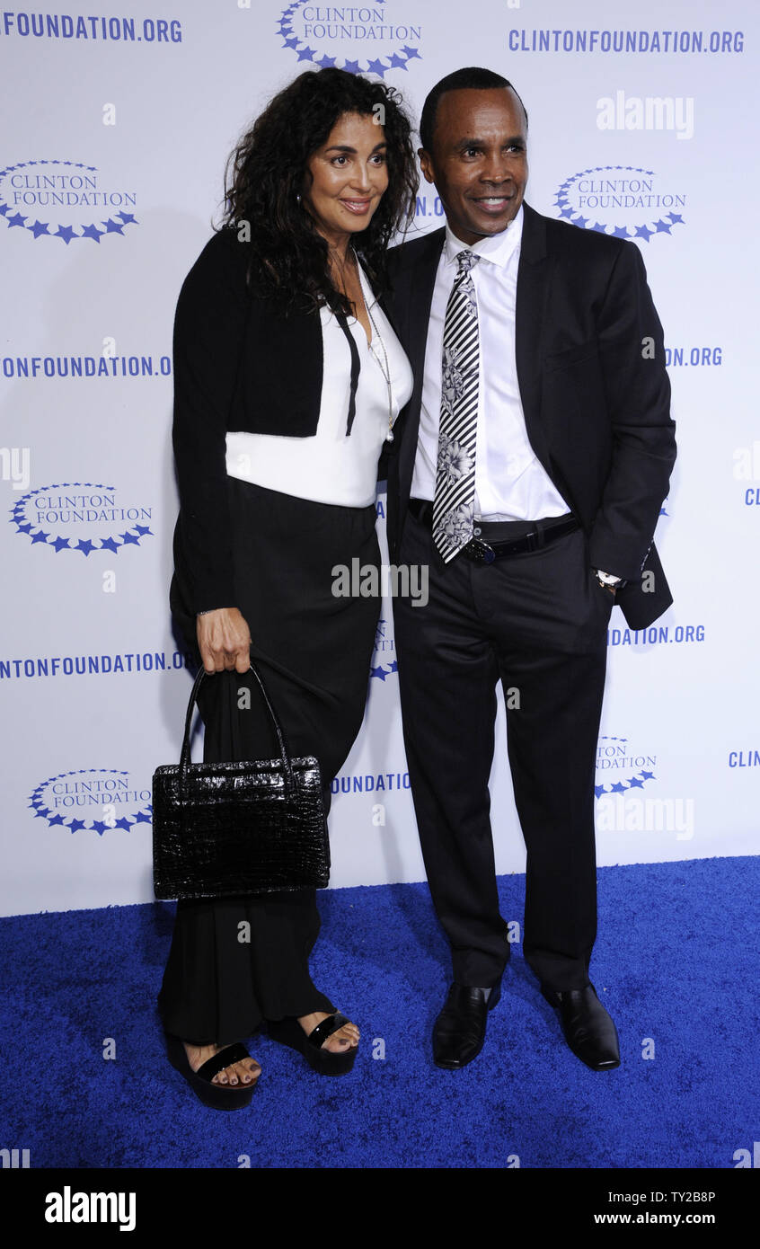 Sugar Ray Leonard (R) and wife Bernadette Robi attend the Clinton ...