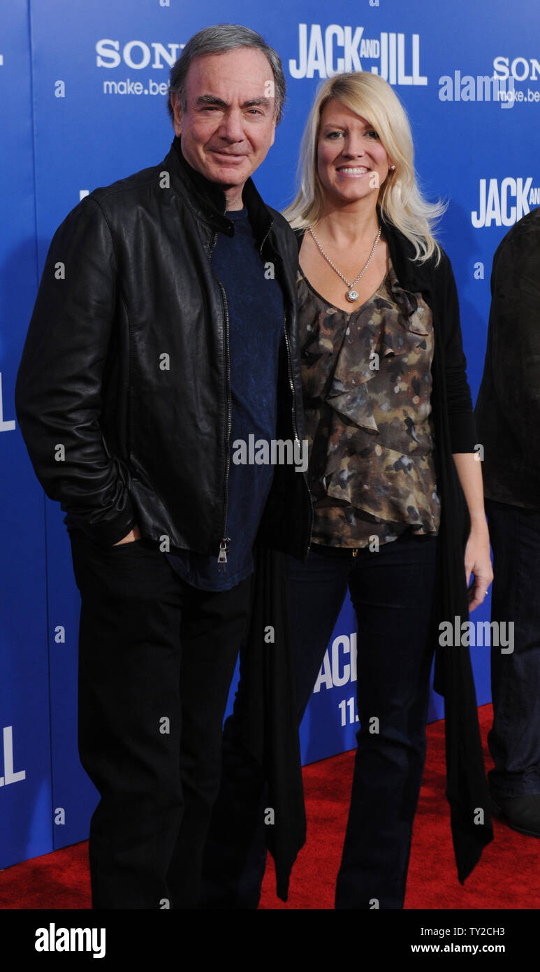 Singer Neil Diamond and his girlfriend Katie McNeil attend the premiere ...