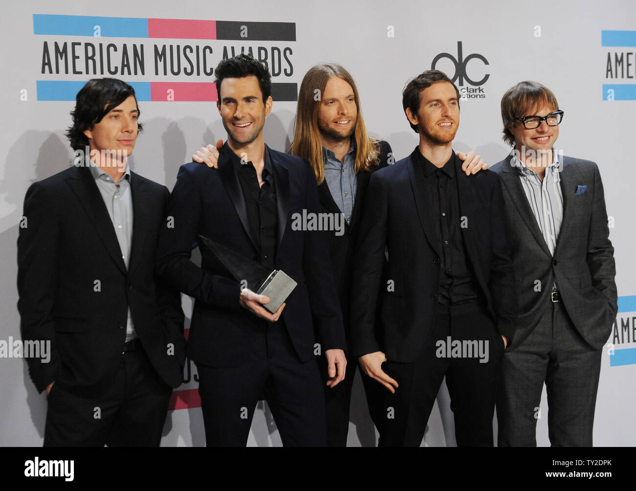 Maroon 5 appears backstage with the favorite band, duo or group award ...
