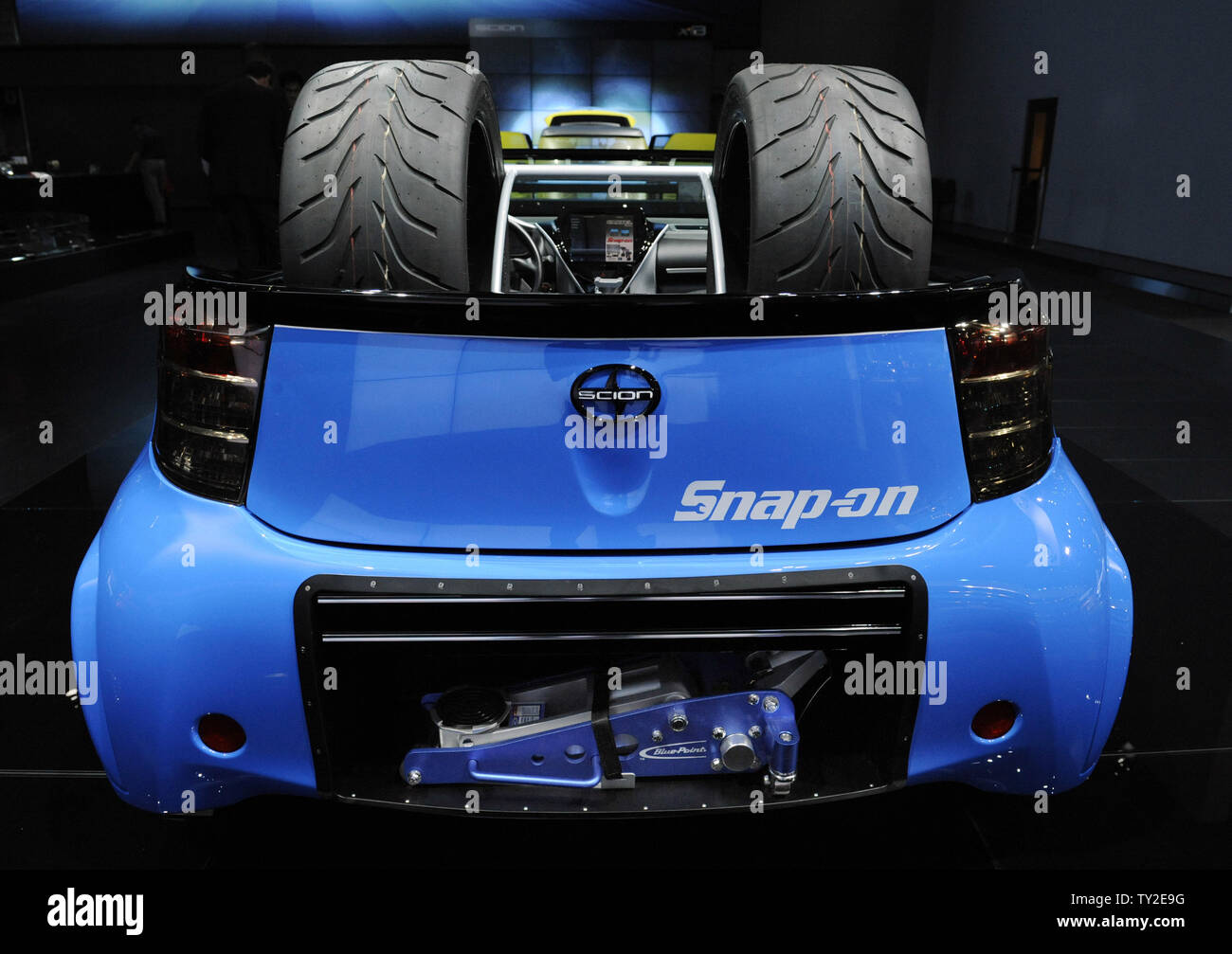 A Scion iQ modified by Cartel, complete with two spare racing tires and ...