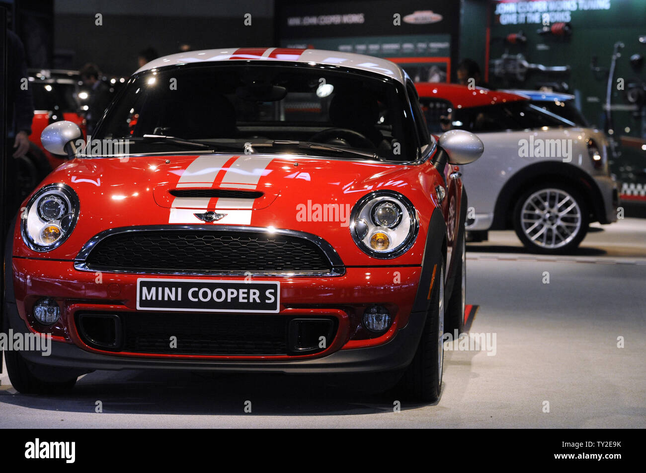 Mini Cooper S Coupes are on display at the Los Angeles Auto Show held ...