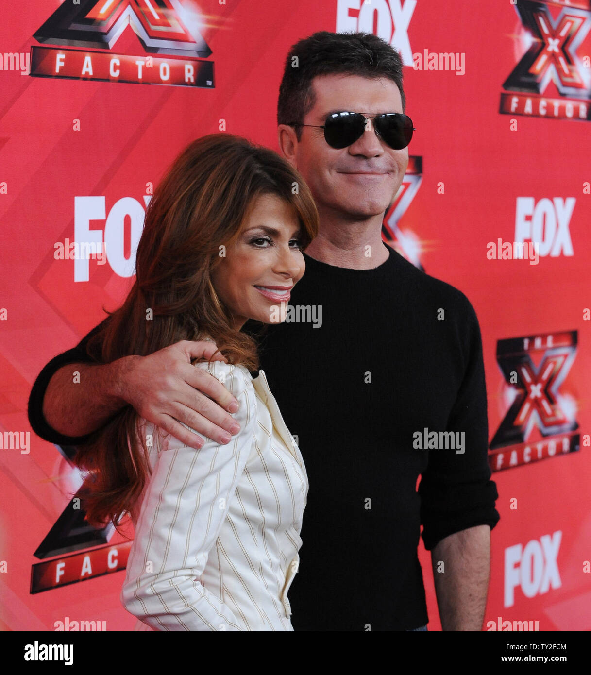 "The X Factor" judges Paula Abdul (L) and Simon Cowell pose following "The X Factor" news ...