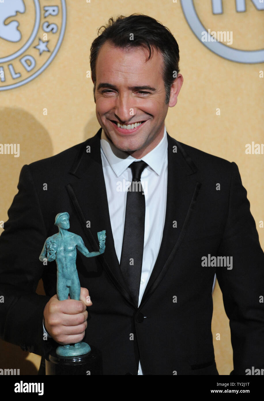 French actor Jean Dujardin appears backstage with the outstanding ...