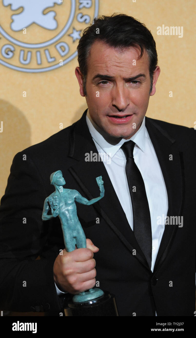 French actor Jean Dujardin appears backstage with the outstanding ...