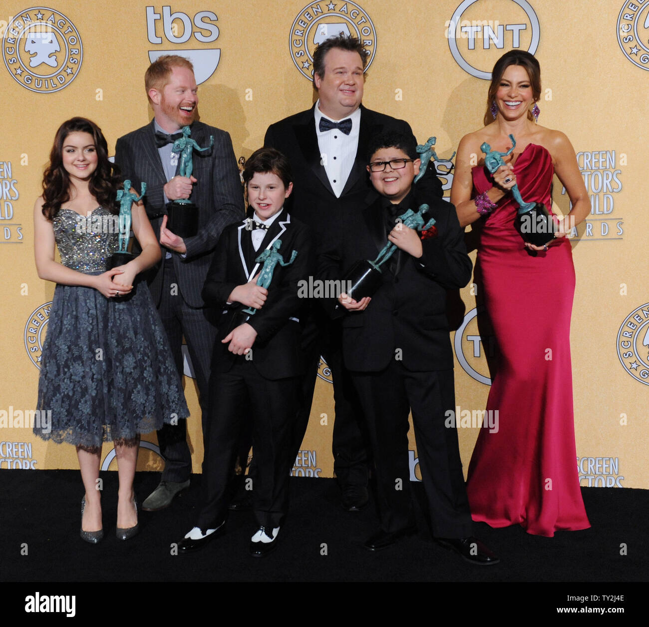 "Modern Family" cast members appear backstage with the award they ...