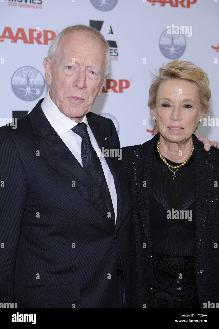 Max Von Sydow (L) and wife Catherine Brelet attend the AARP The ...