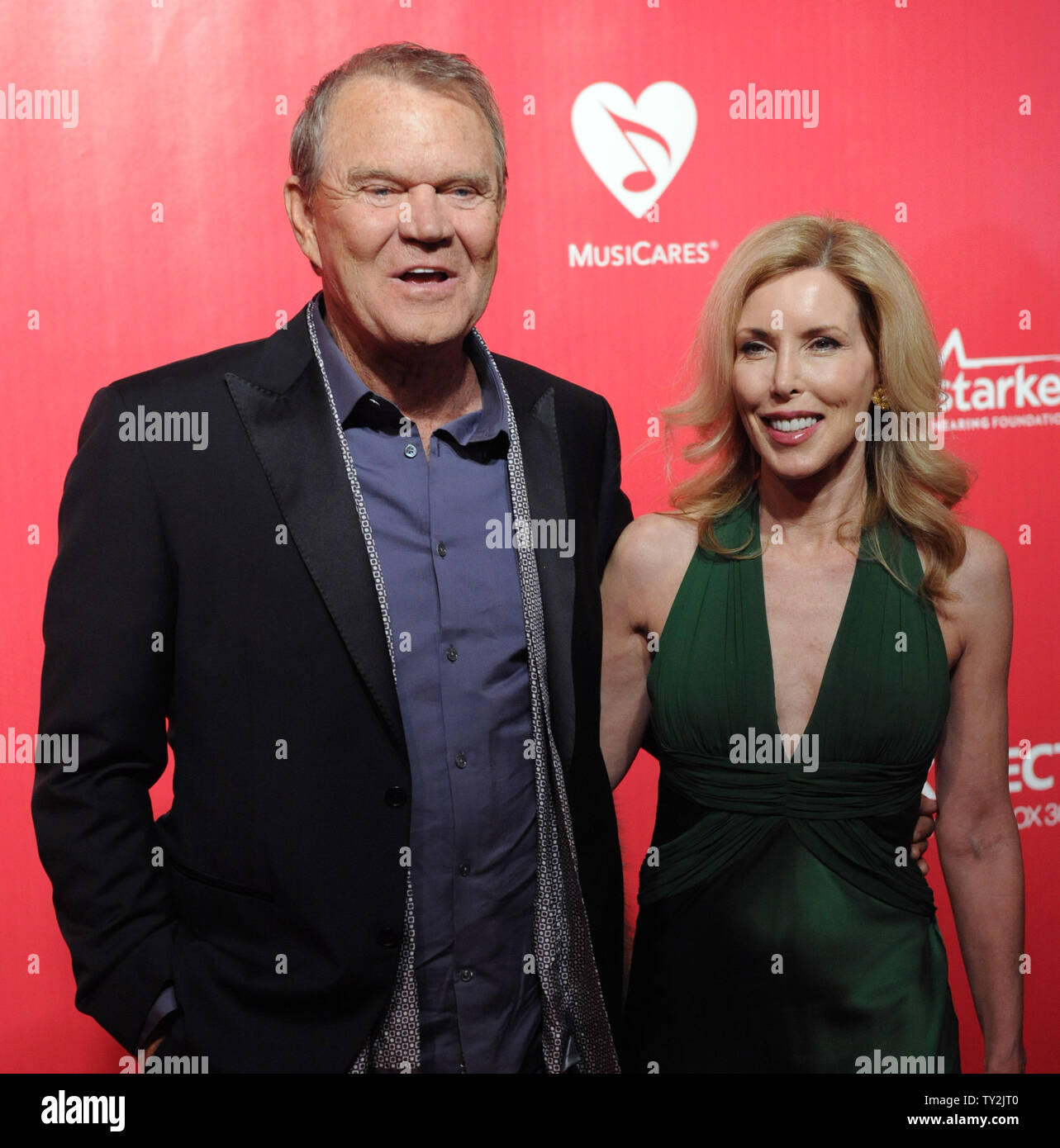 Musician Glenn Campbell and his wife Kim Woolen arrive for the ...