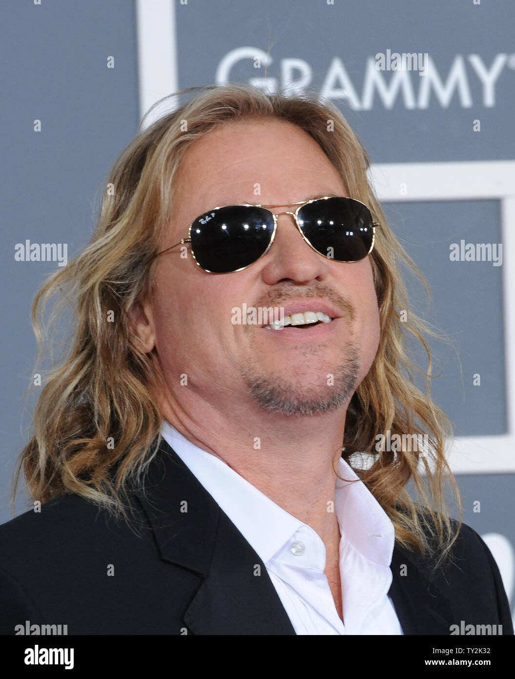 Val Kilmer arrives at the 54th annual Grammy Awards at the Staples ...