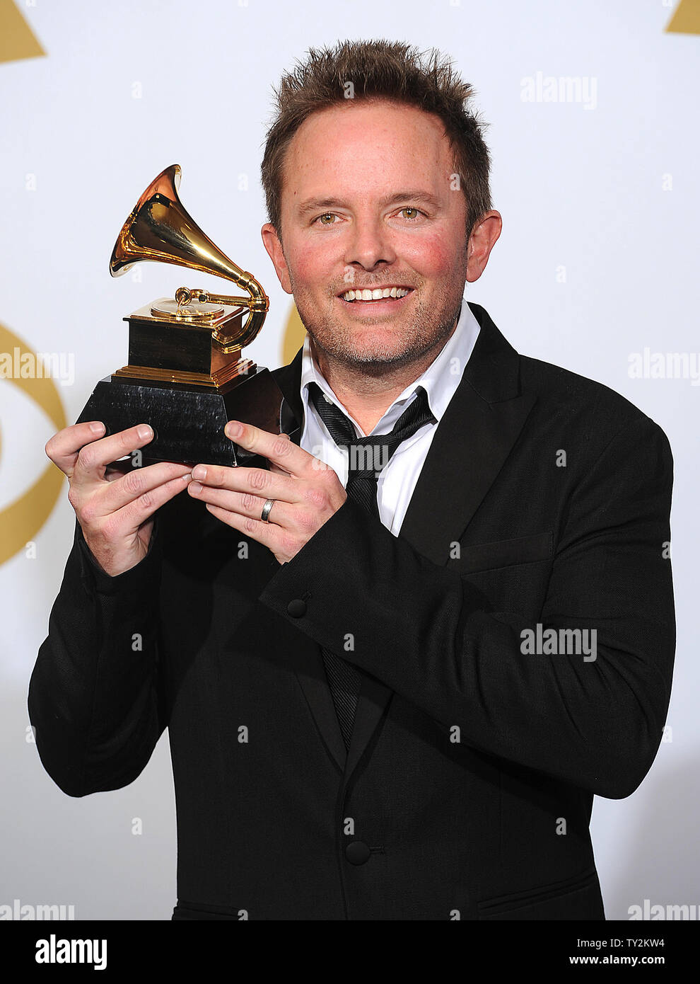 Chris Tomlin holds Grammy for Best Contemporary Christian Music Album ...