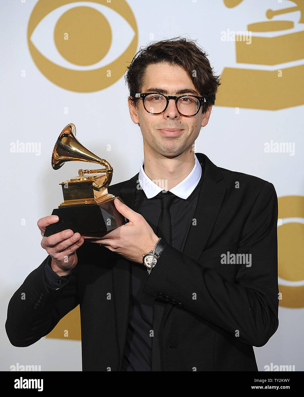 Sam O'Kell holds Best Historical Album Grammy for Paul McCartney and ...