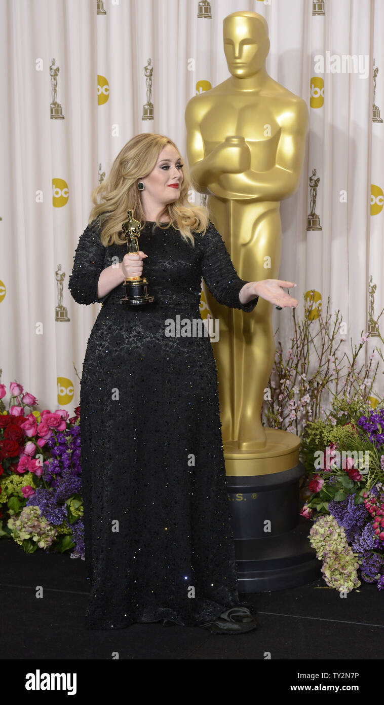 Adele Adkins pose with her Oscars for Achievement in Music (Original Song) for "Skyfall ...