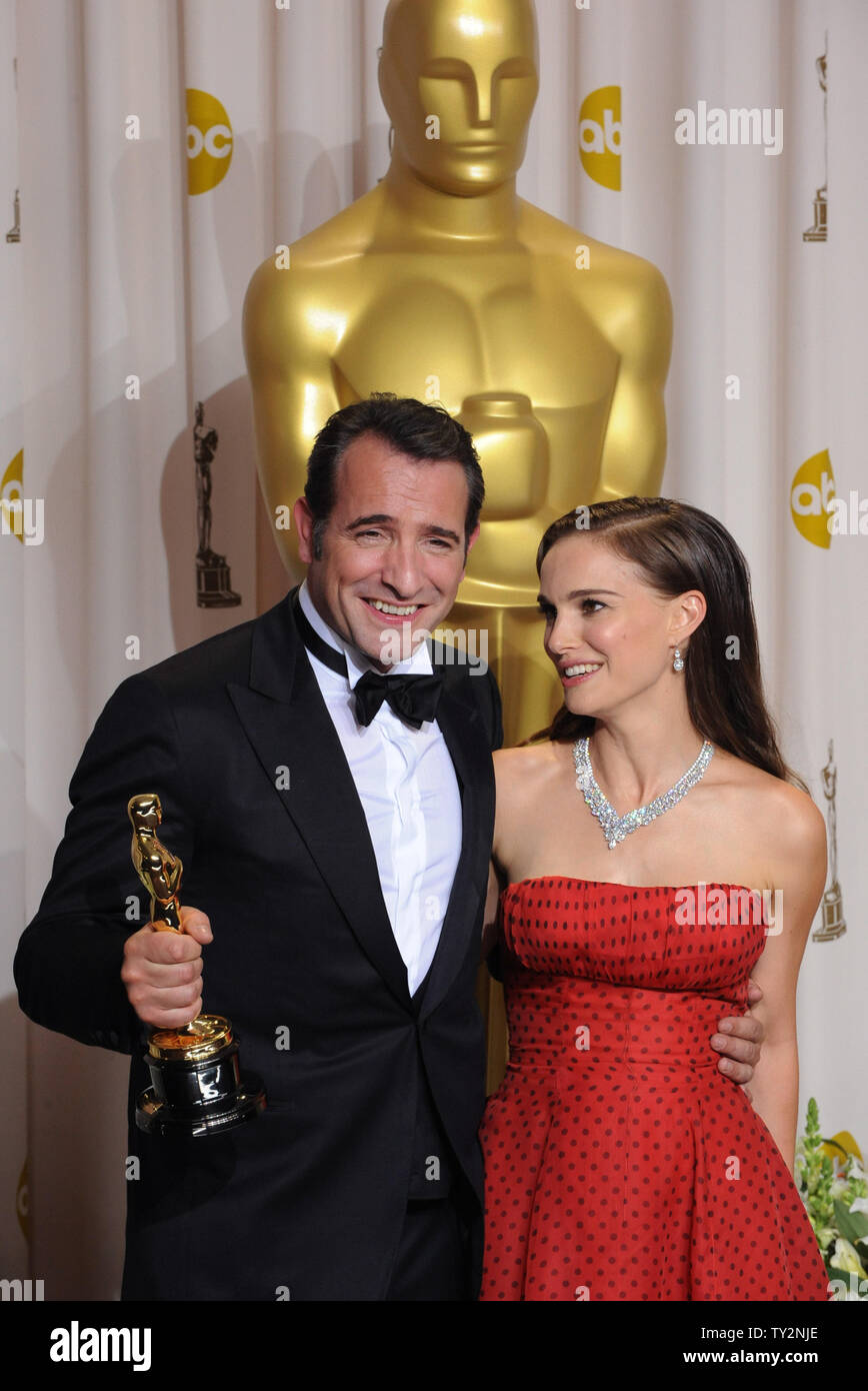 Best Actor Jean Dujardin for the movie "The Artist" appears with ...