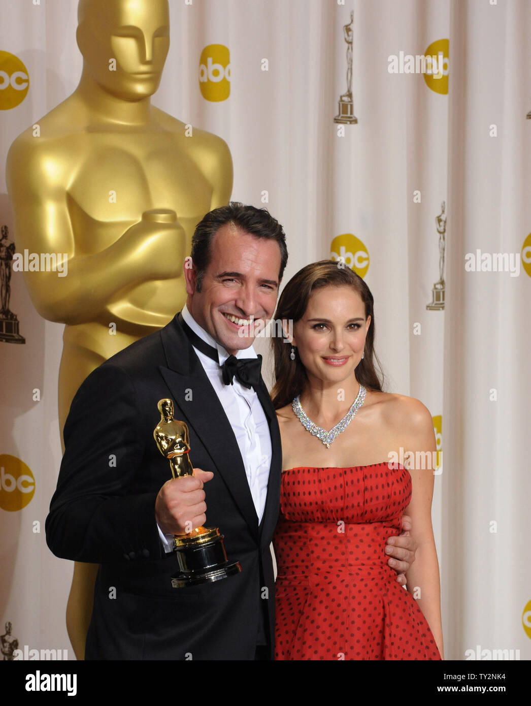Best Actor Jean Dujardin for the movie "The Artist" appears with ...