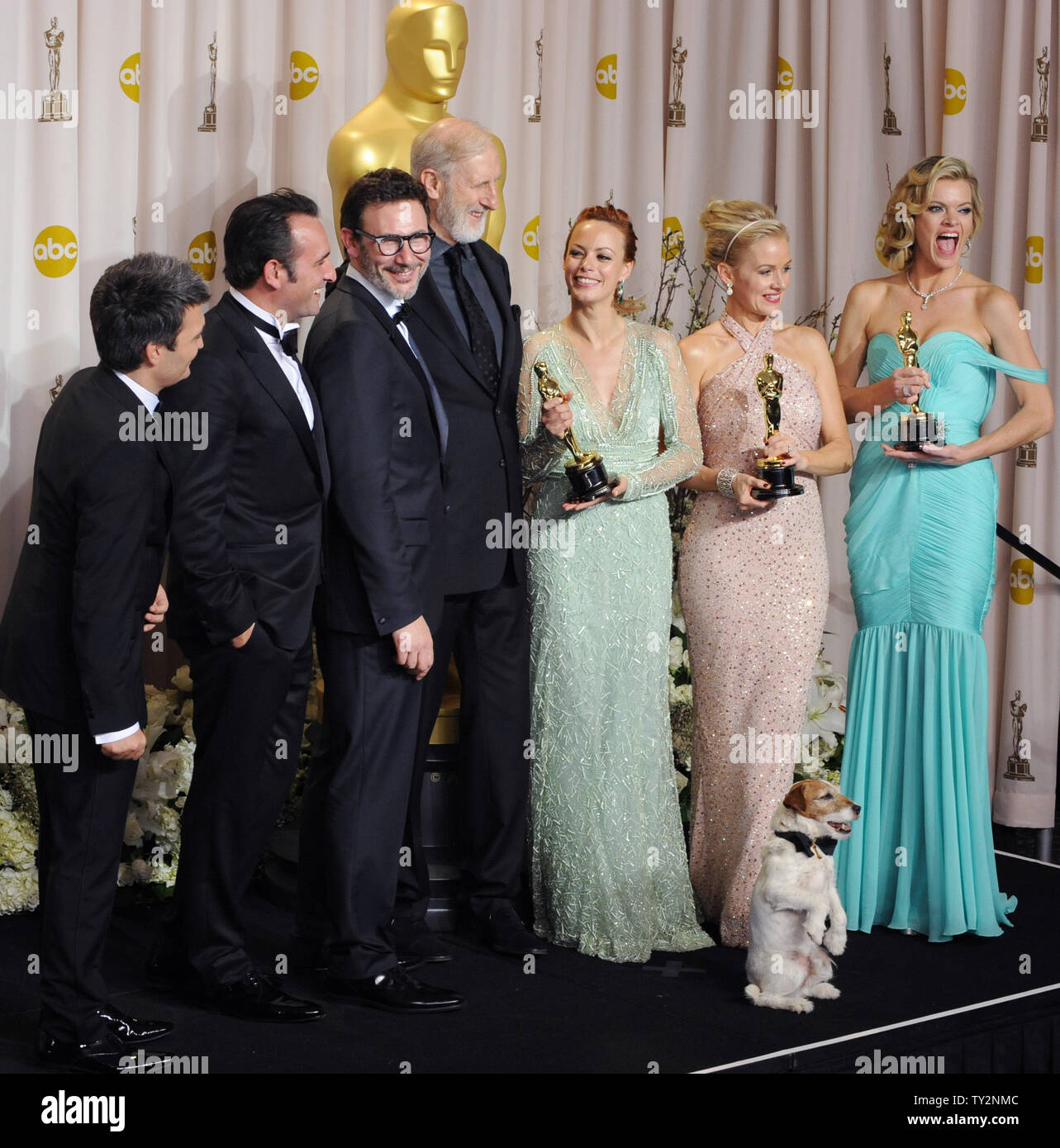 The cast of "The Artist" appears backstage after garnering the Best ...