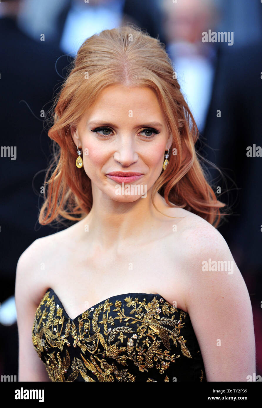 Jessica Chastain arrives on the red carpet at the 84th Academy Awards ...