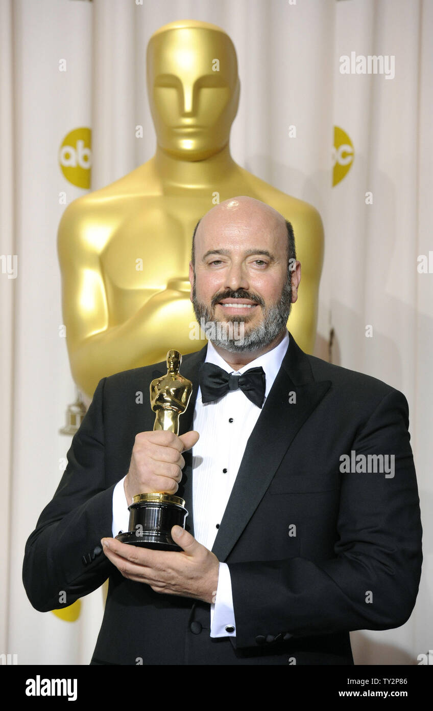 Mark Bridges holds his Oscar for best Costume Design for "The Artist ...