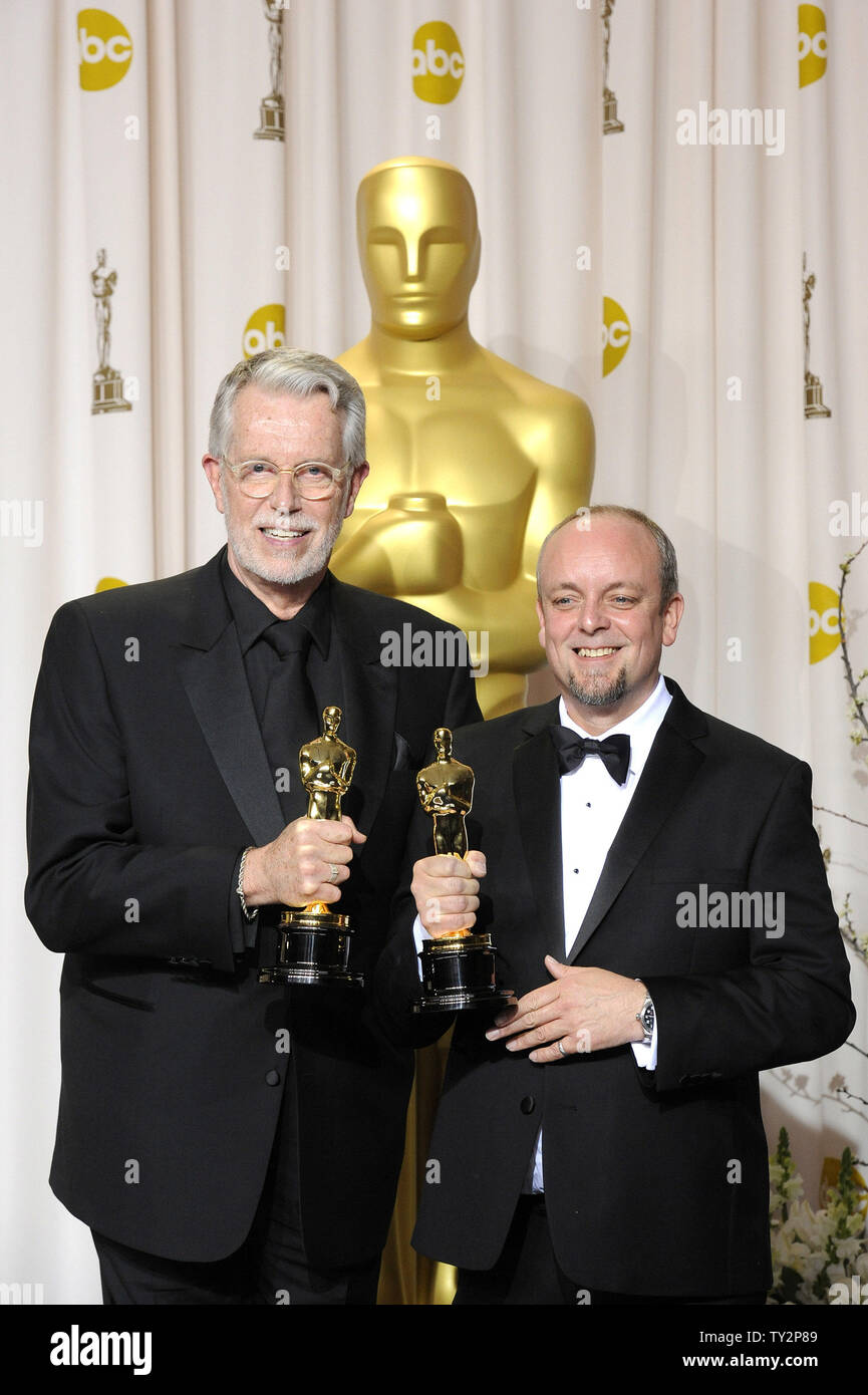 Mark Coulier and J. Roy Helland hold their Oscars for Achievement in ...