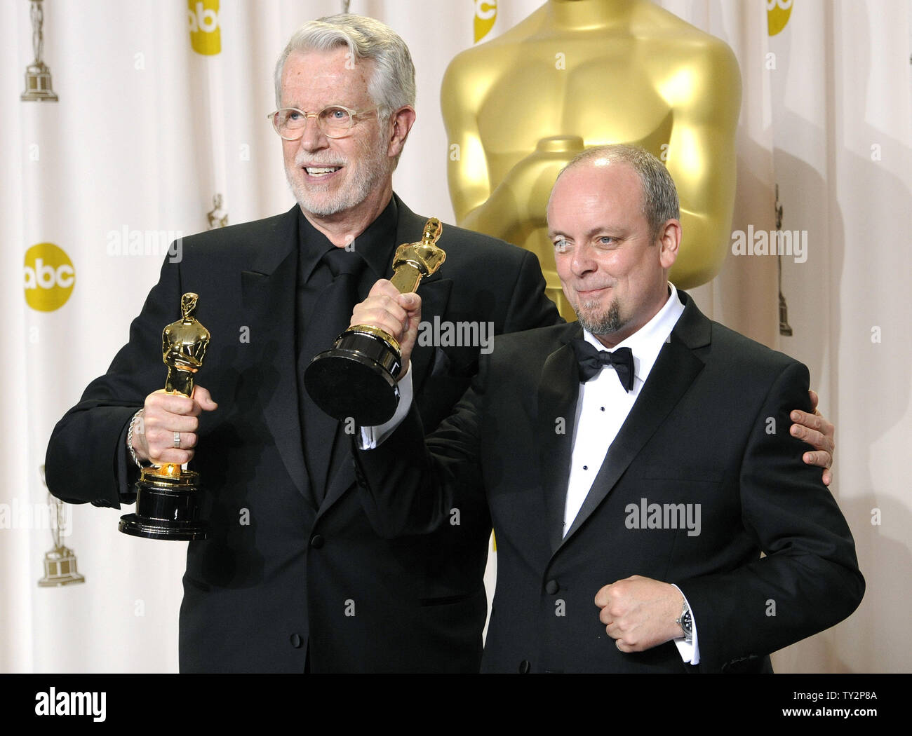 Mark Coulier and J. Roy Helland hold their Oscars for Achievement in ...