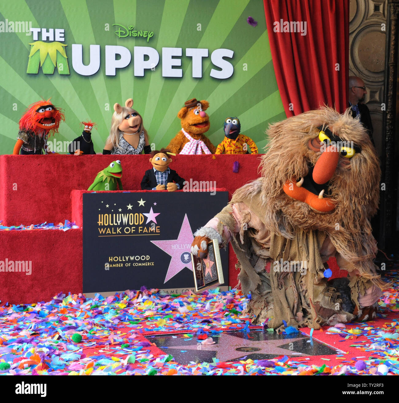 Muppets Animal, Pepe, Miss Piggy, Fozzie, Gonzo, (L-R, rear) and Kermit ...