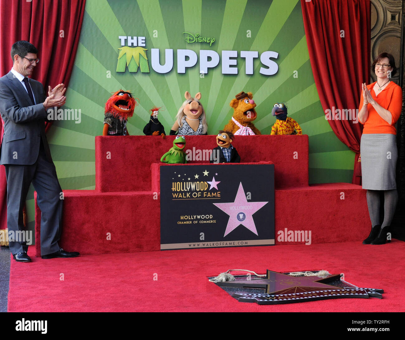 Walt Disney Studios President Rich Ross (L) and Lisa Henson attend the ...