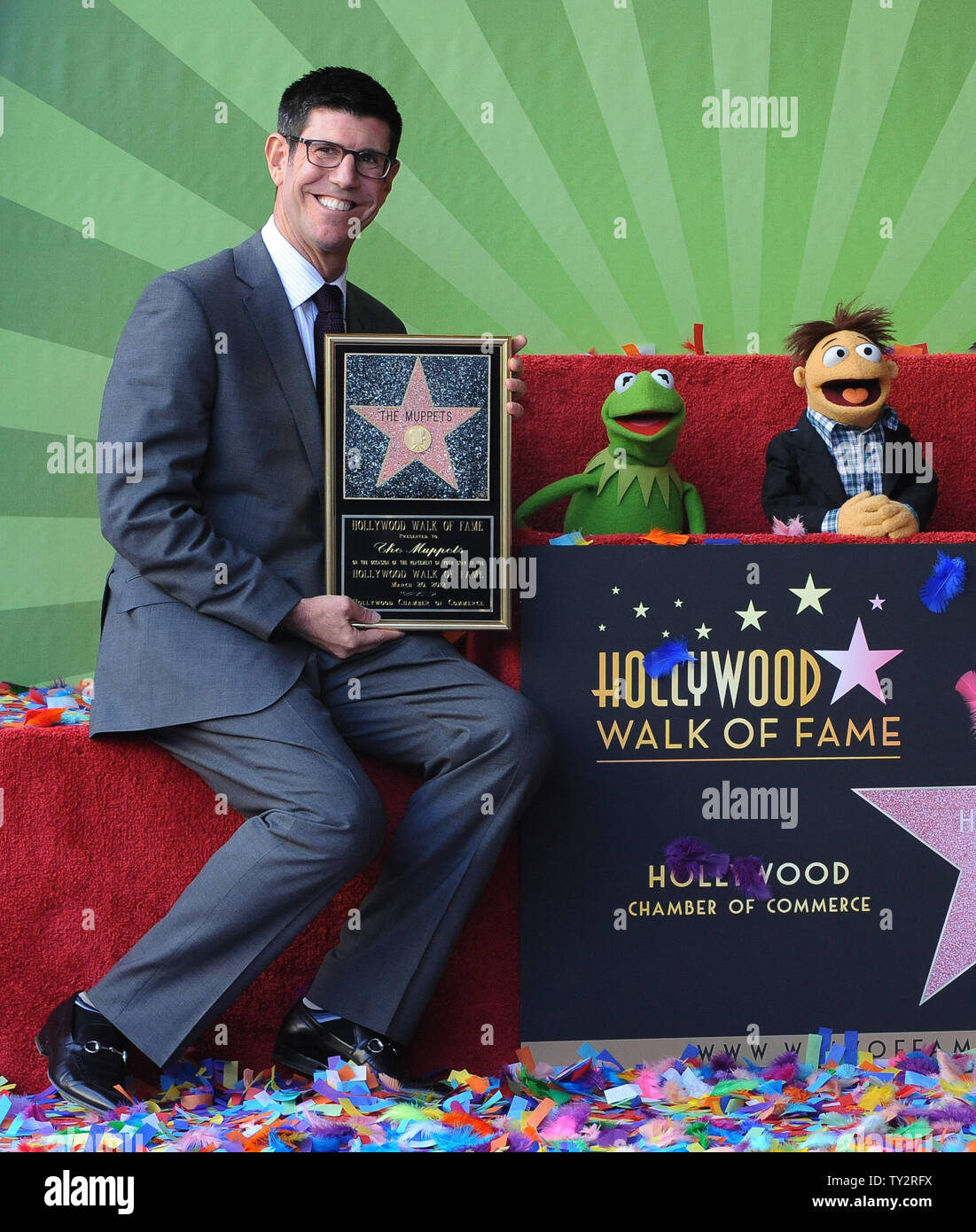 Walt Disney Studios President Rich Ross (L) attends the Inimitable ...