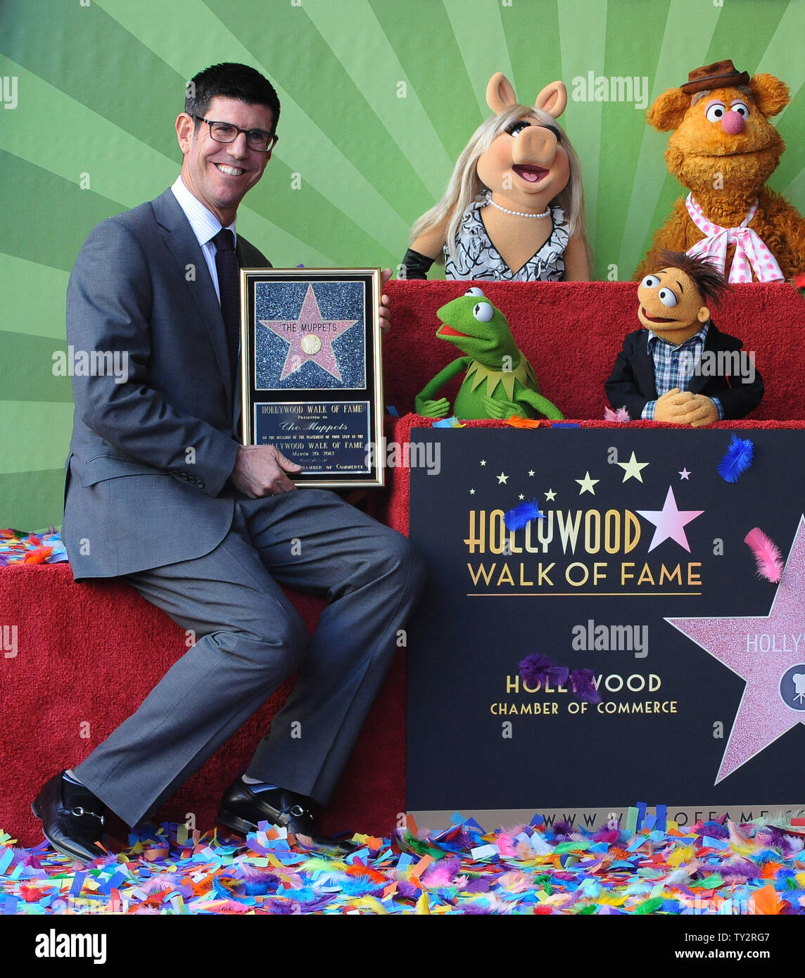 Walt Disney Studios President Rich Ross (L) attends the Inimitable ...