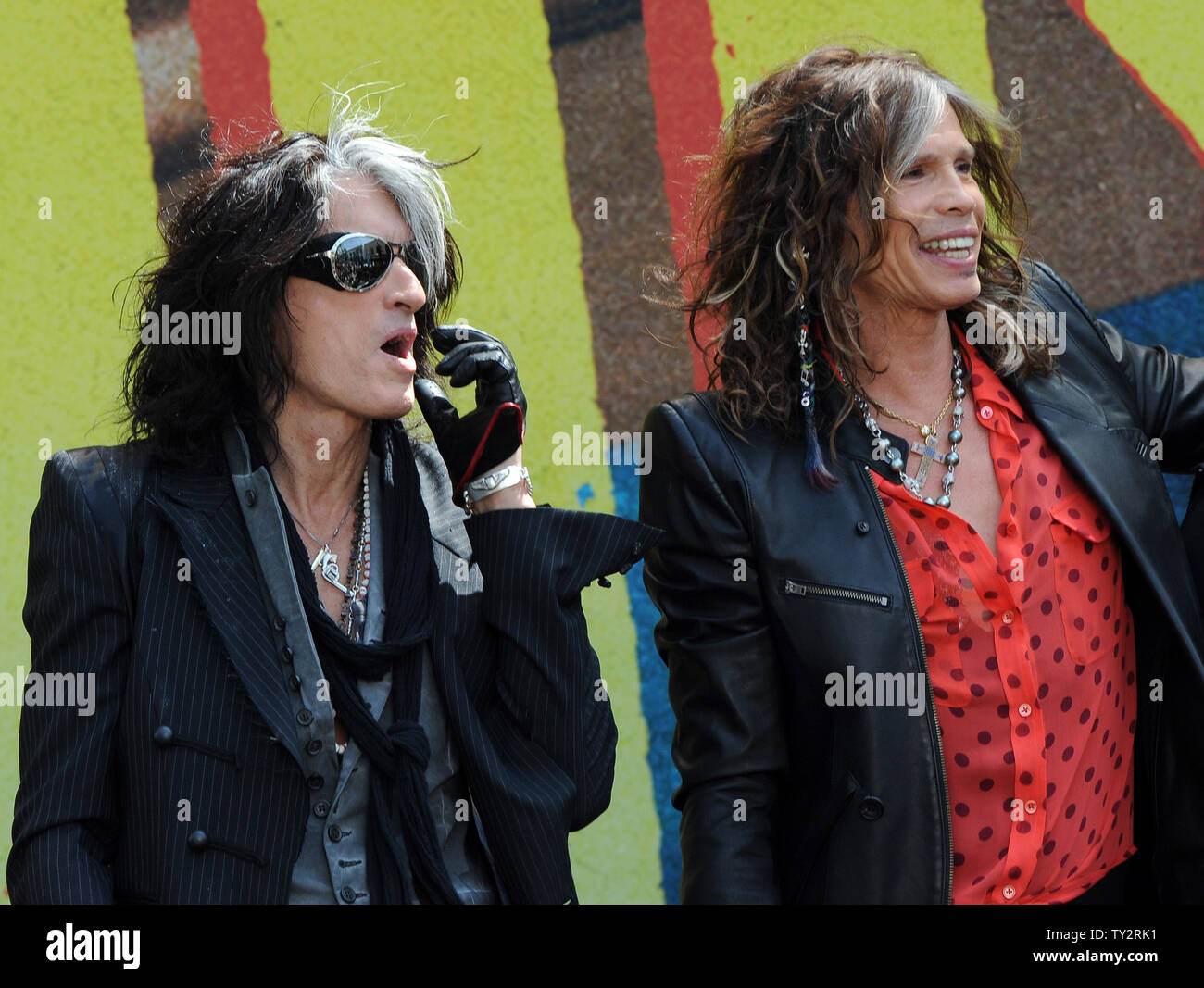 Guitarist Joe Perry (L) and Steve Tyler, lead singer in the rock band ...