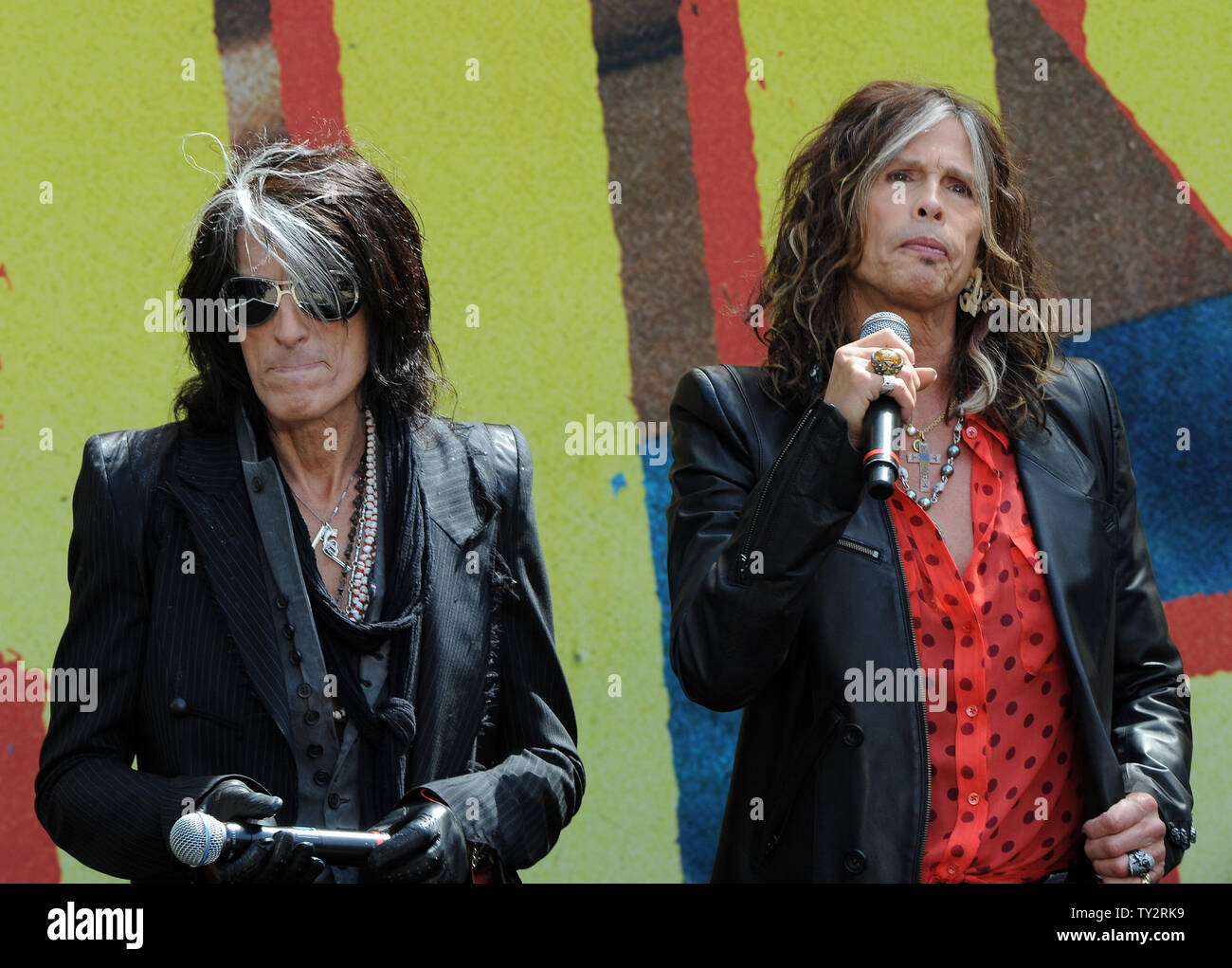 Guitarist Joe Perry (L) and Steve Tyler, lead singer in the rock band ...
