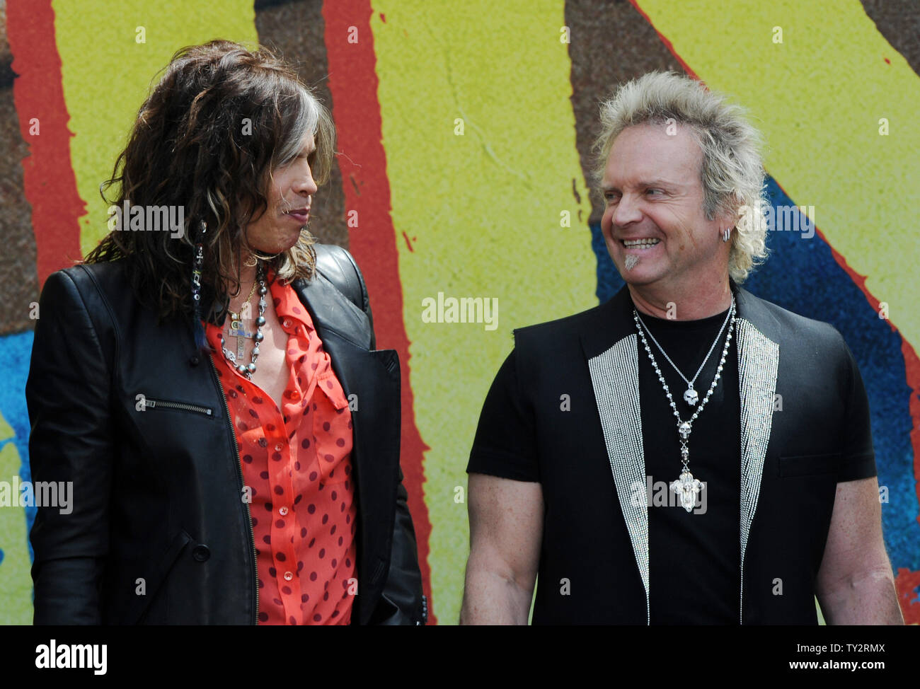 Steve Tyler (L) and Joey Kramer, members of the rock band Aerosmith ...