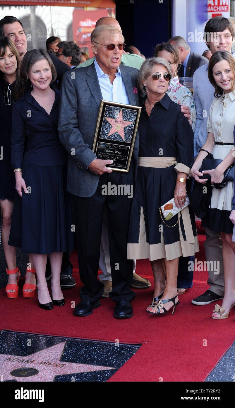 Actor Adam West hugs his wife Marcelle Lear surrounded by family ...