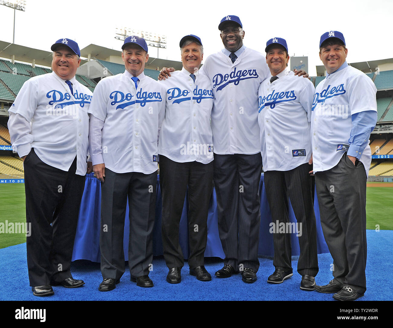 New owners of the Los Angeles Dodgers (L-R) Robert L Patton, Jr., Stan ...