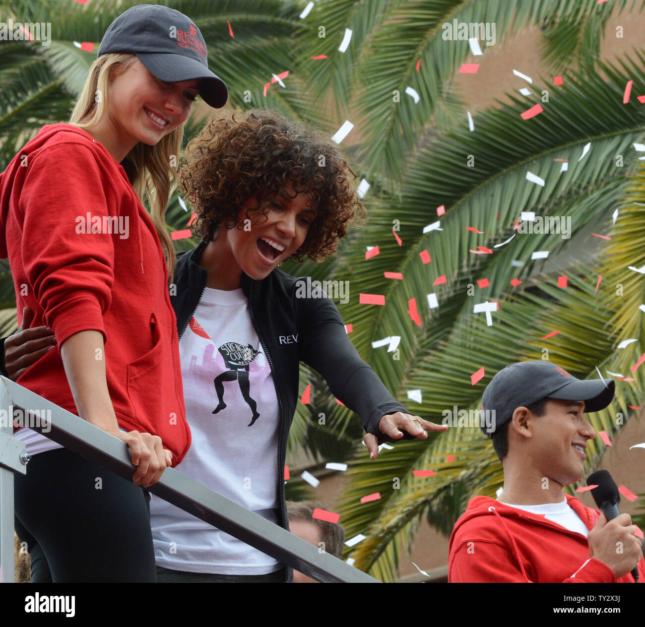 Actresses Stacy Keibler and Halle Berry participates in the 19th annual ...