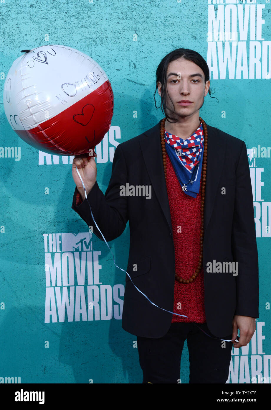 Actor Ezra Miller arrives at the MTV Movie Awards at the Gibson ...