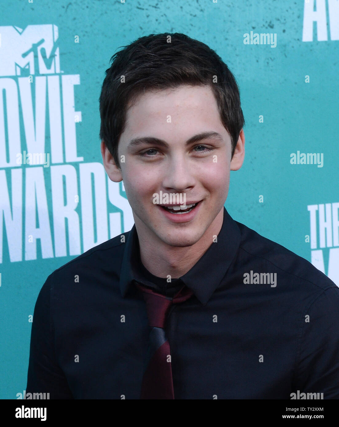 Actor Logan Lerman arrives at the MTV Movie Awards at the Gibson ...