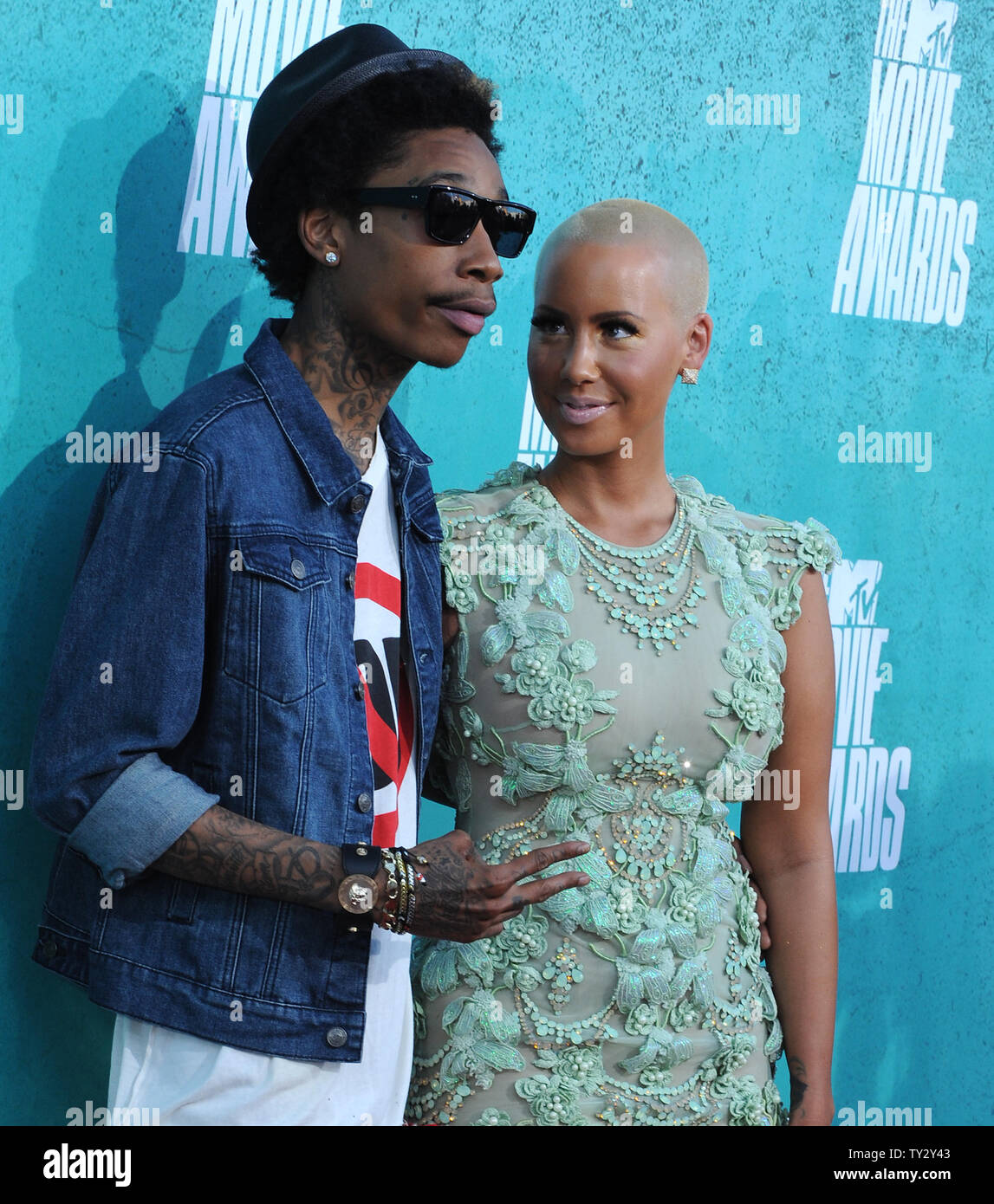 (L-R) Rapper Wiz Khalifa and model Amber Rose arrive at the MTV Movie ...