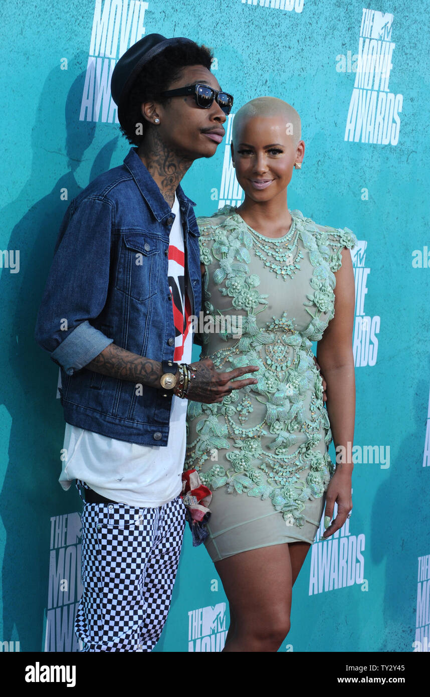 (L-R) Rapper Wiz Khalifa and model Amber Rose arrive at the MTV Movie ...