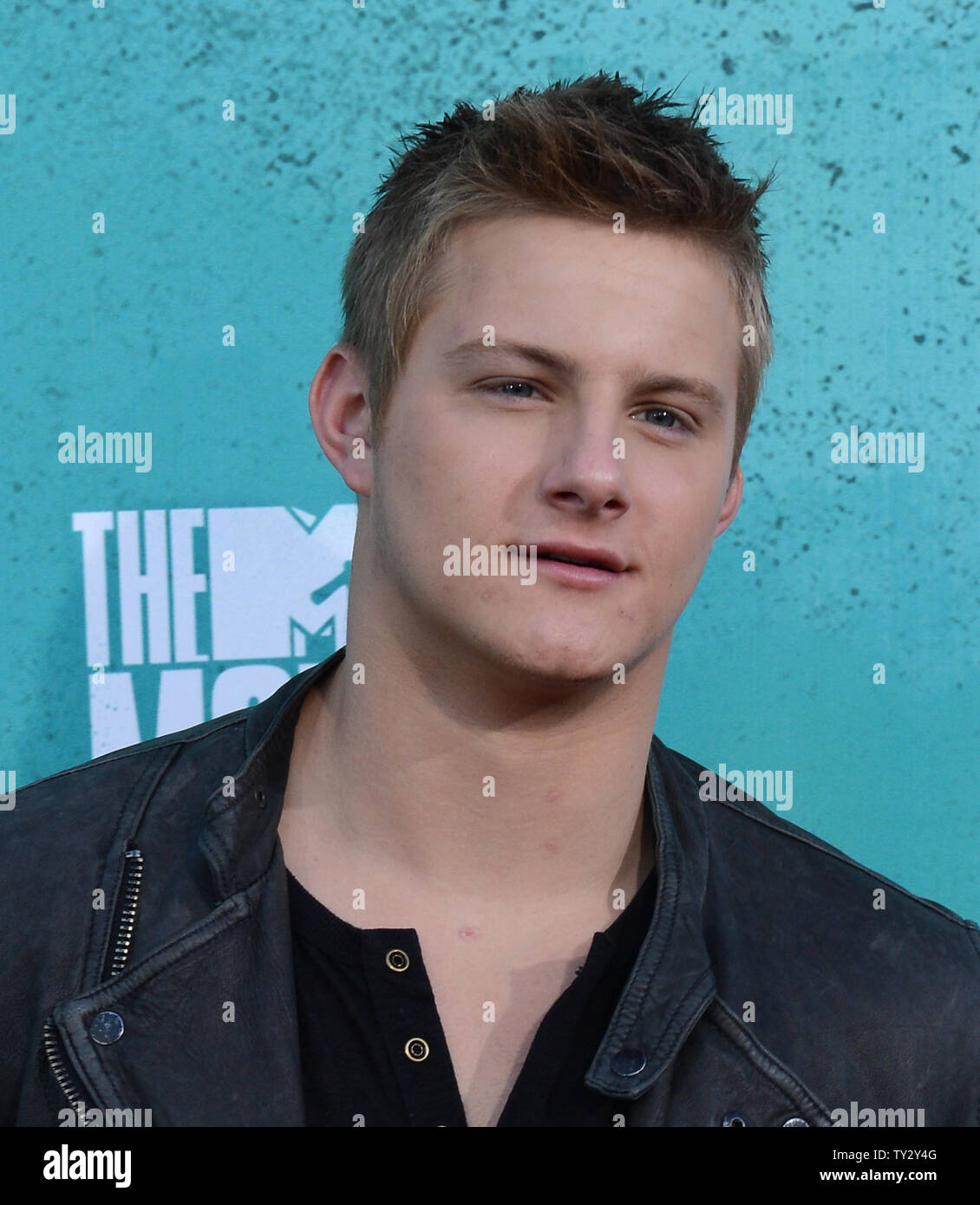 Actor Alexander Ludwig arrives at the MTV Movie Awards at the Gibson ...
