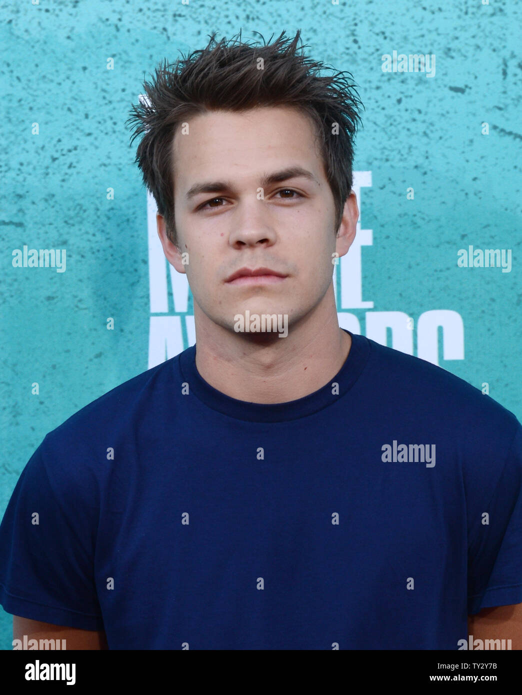 Actor Johnny Simmons arrives at the MTV Movie Awards at the Gibson ...