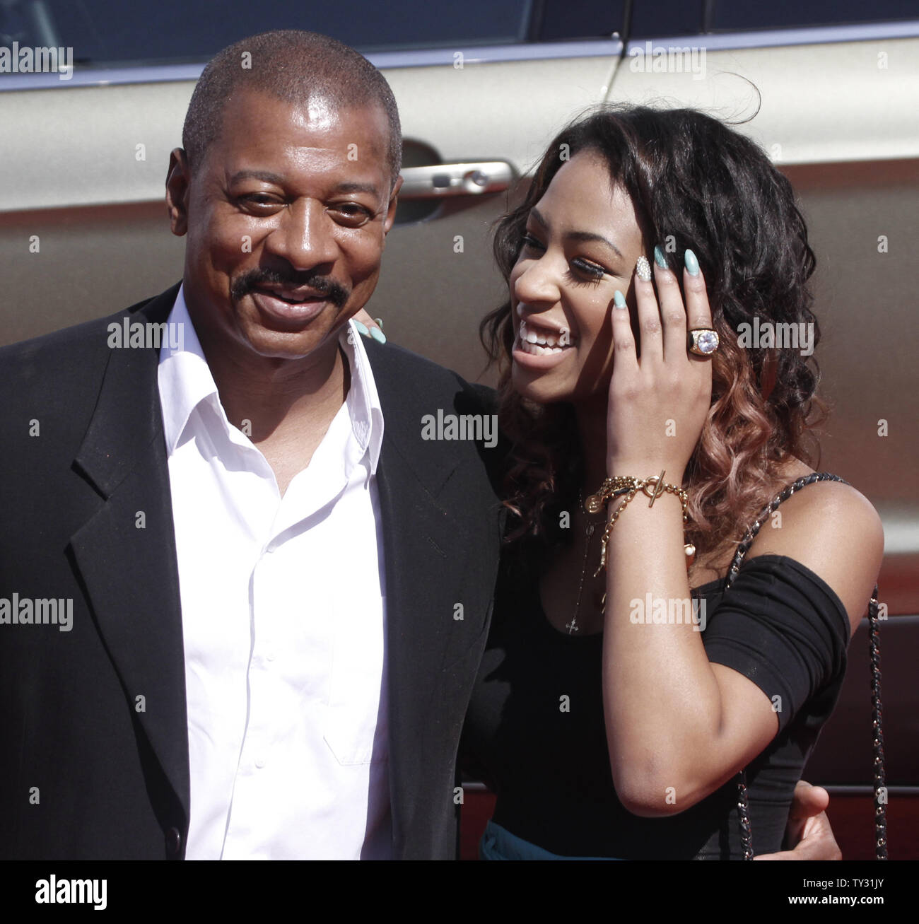 Actor Robert Townsend (L) and guest arrive for the BET Awards 12 at the ...