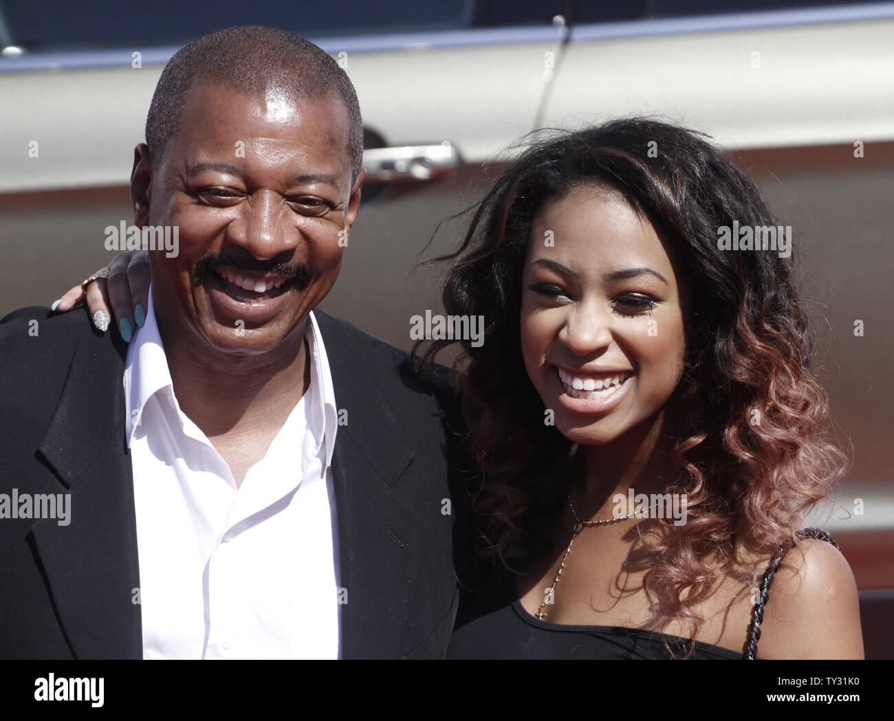 Actor Robert Townsend (L) and guest arrive for the BET Awards 12 at the ...