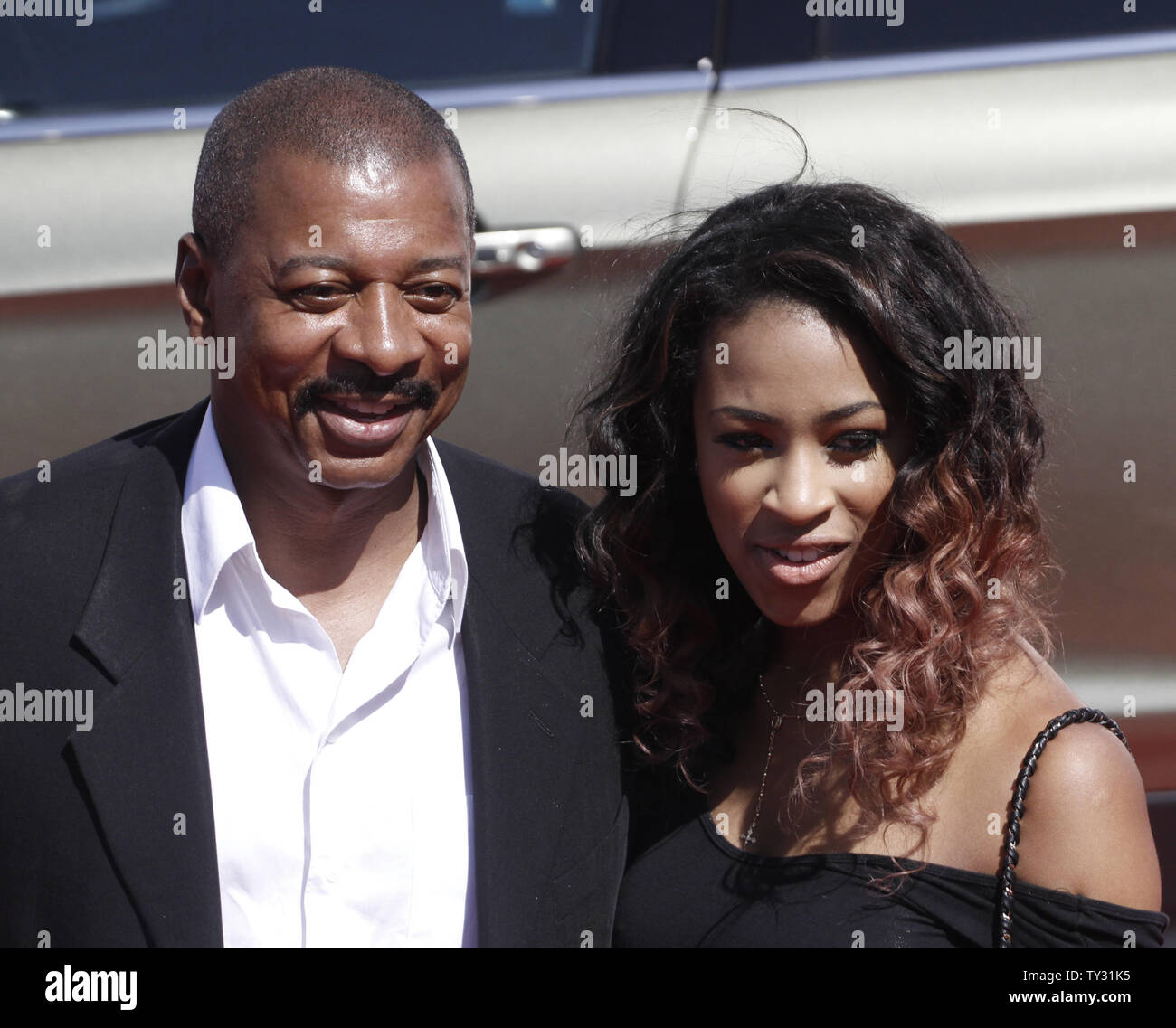 Actor Robert Townsend (L) and guest arrive for the BET Awards 12 at the ...