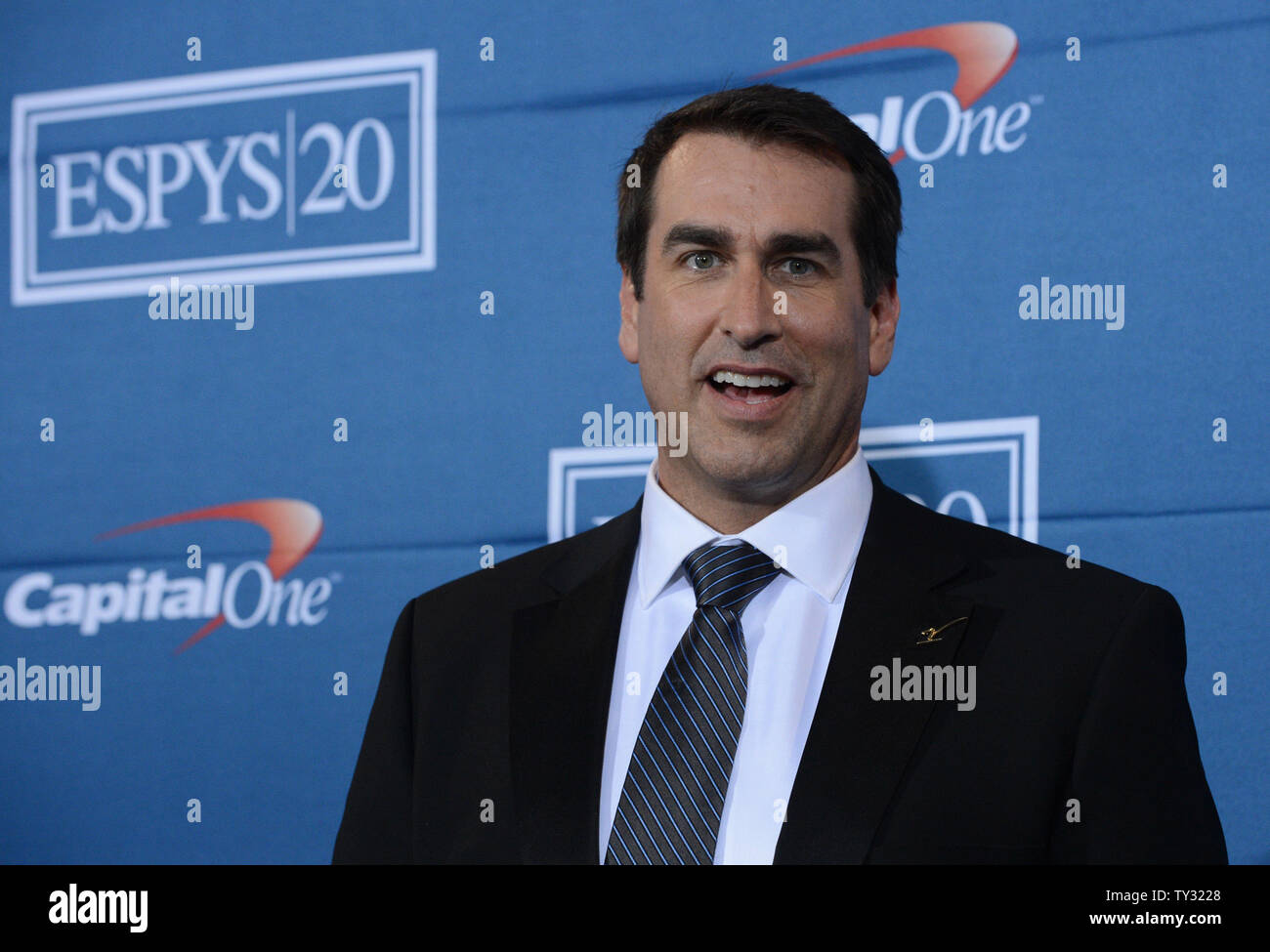 Host Bob Riggle appears backstage after being honored with the Jimmy V ...