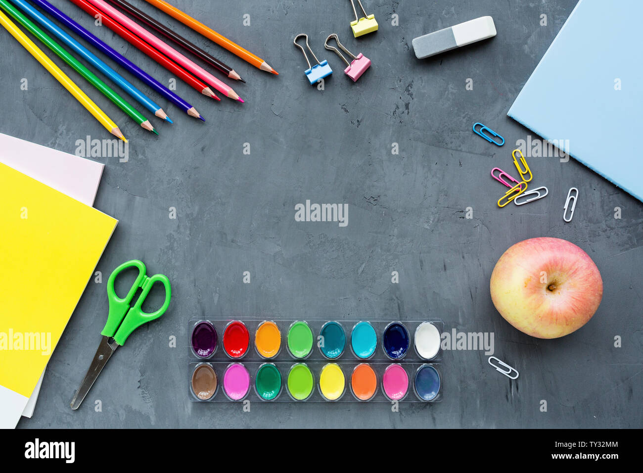 Orange back to school flat lay with bright stationery. School supplies ...