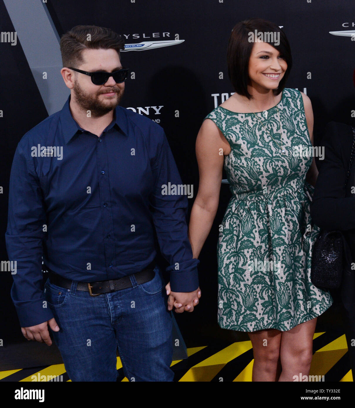 Jack Osbourne (L) and his wife Lisa Stelly Osbourne attend the premiere ...