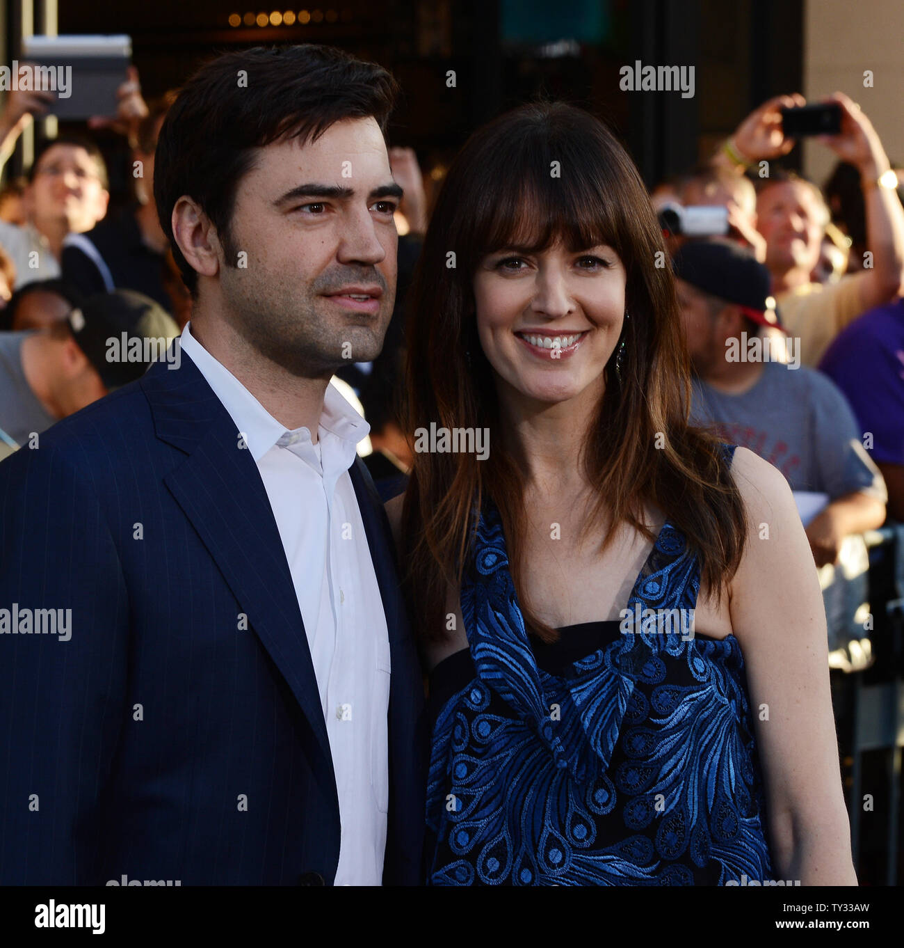 Ron Livingston (L) and Rosemarie DeWitt, cast members in the motion ...