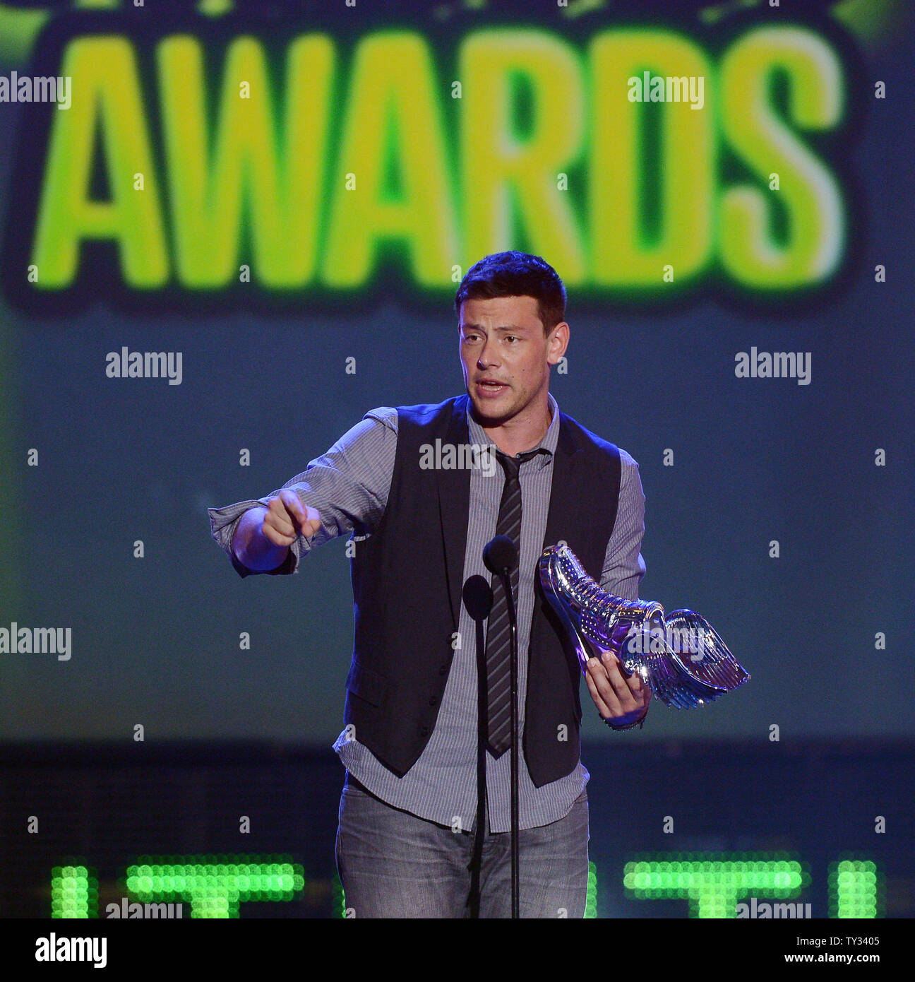 Actor Cory Monteith accepts his trophy after being selected the TV Star ...